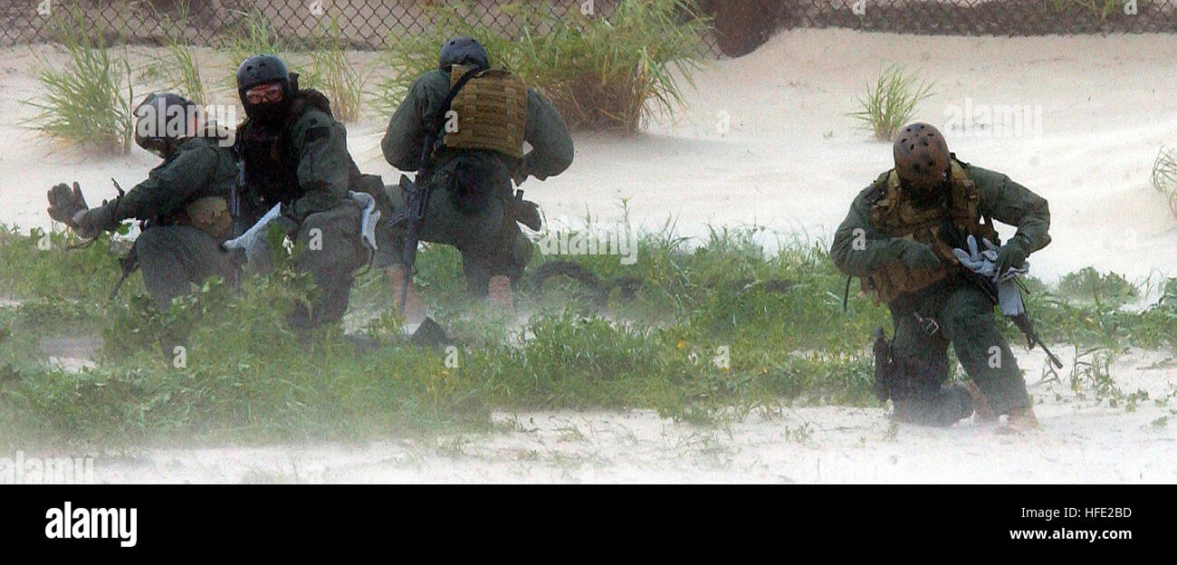 U.S. Navy SEALs perform a demonstration of seizing a beach during a ...