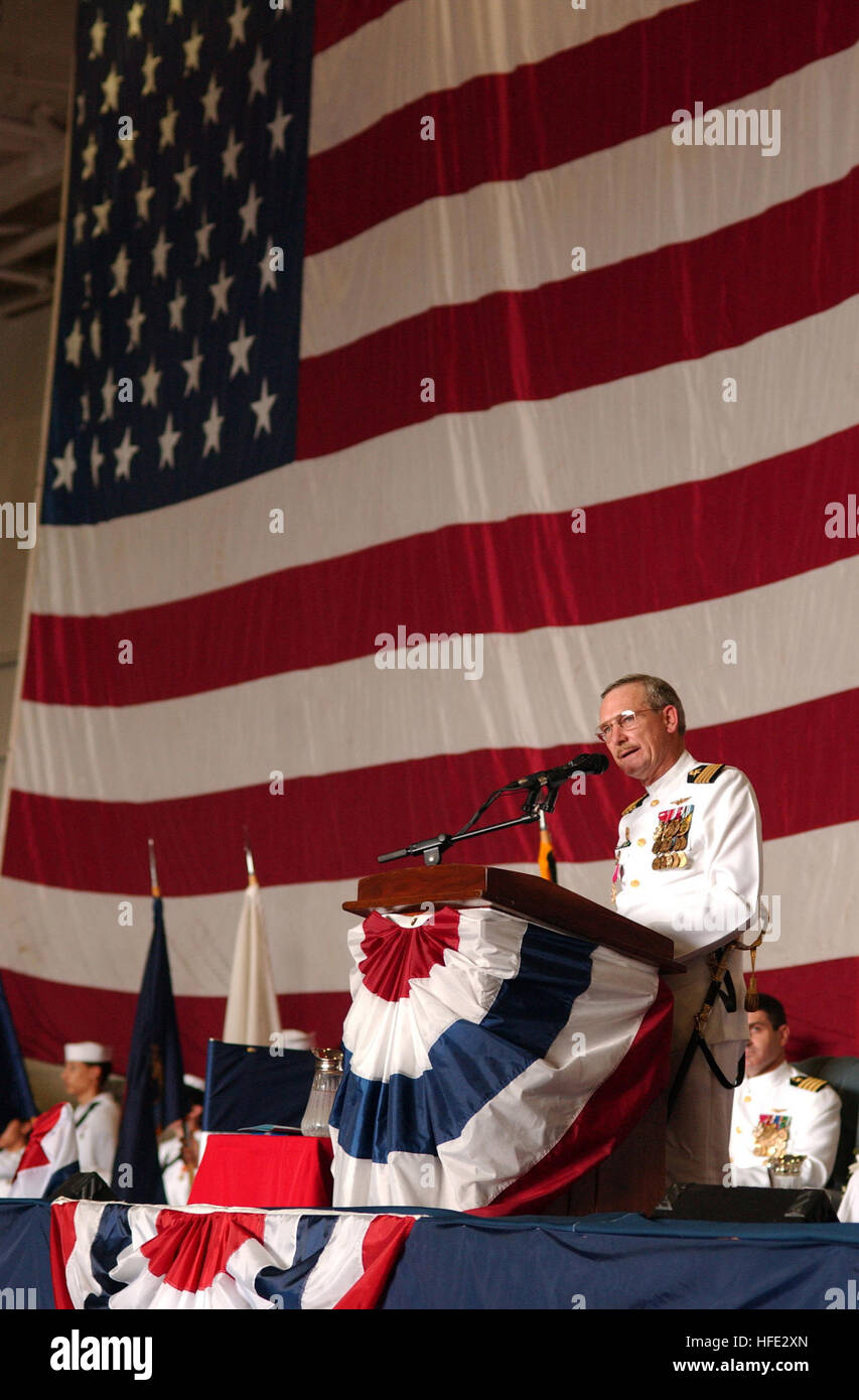 The Commanding Officer of USS Harry S. Truman (CVN 75) delivers a ...