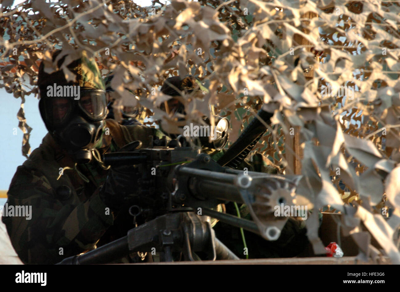 A Seabee from Naval Mobile Construction Battalion 40 (NMCB-40) operates ...