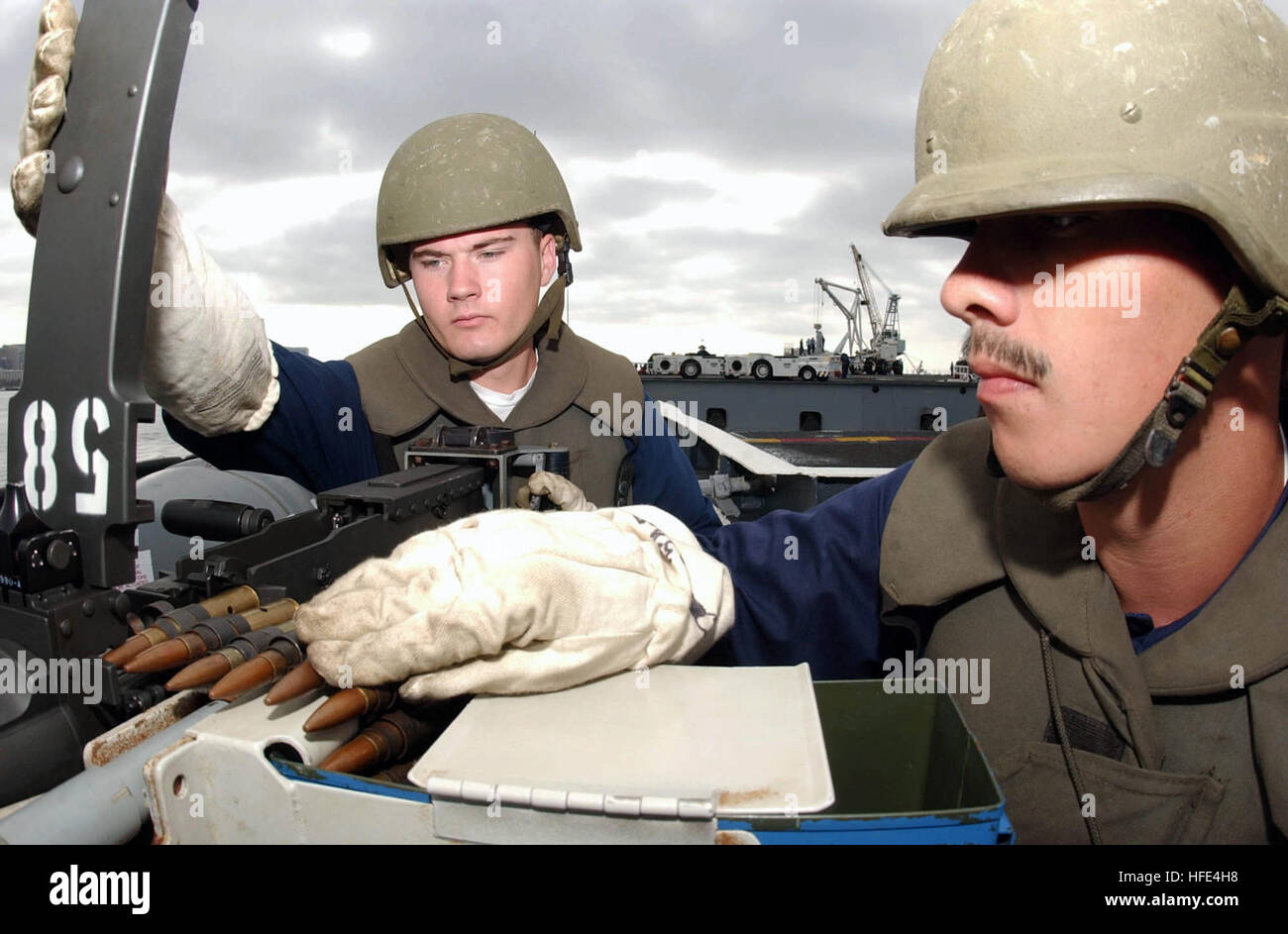 Aviation Ordnancemen aboard USS Nimitz (CVN 68) practice loading drills ...