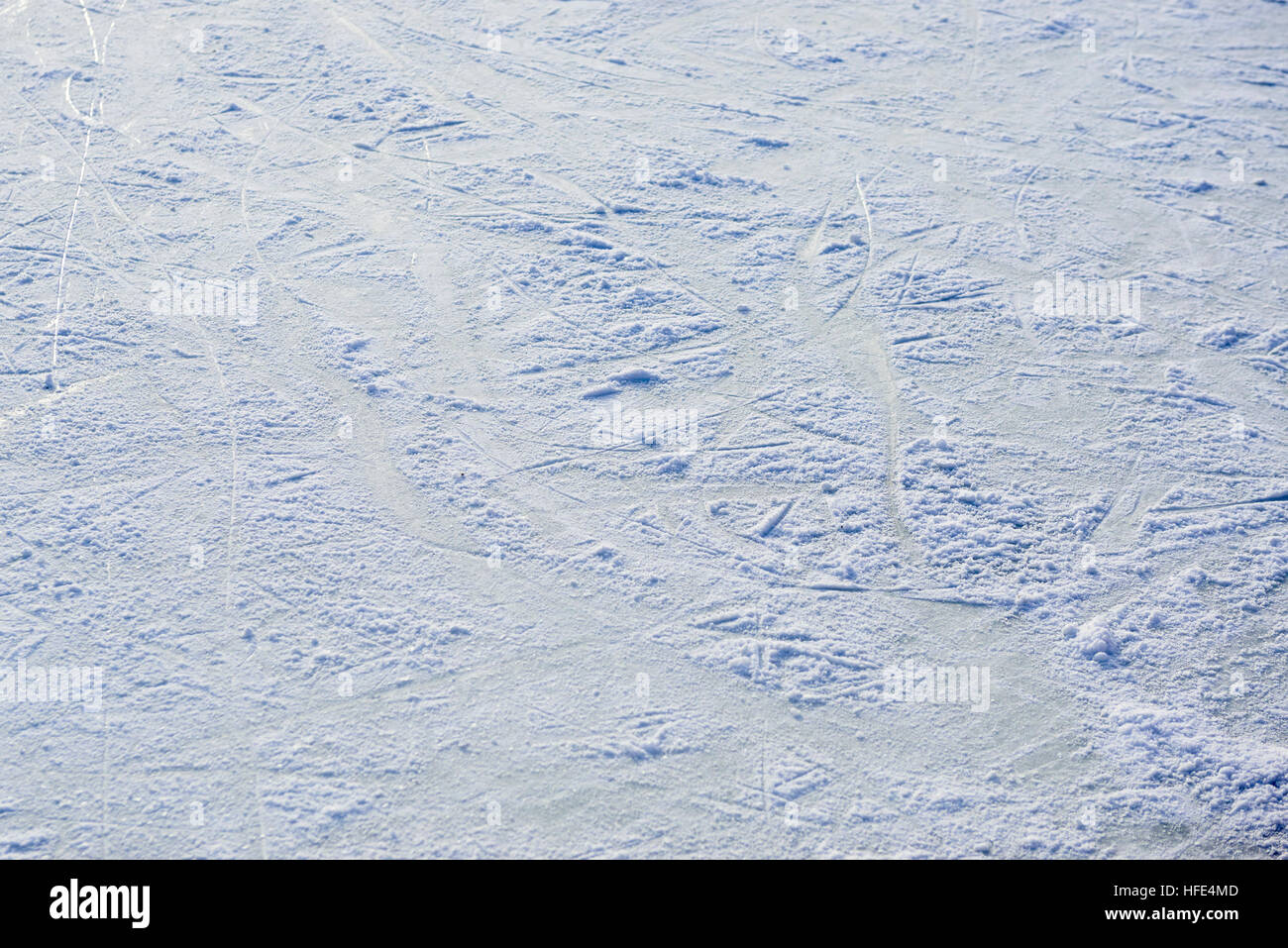 ice background with marks from skating and hockey, Ice rink floor ...