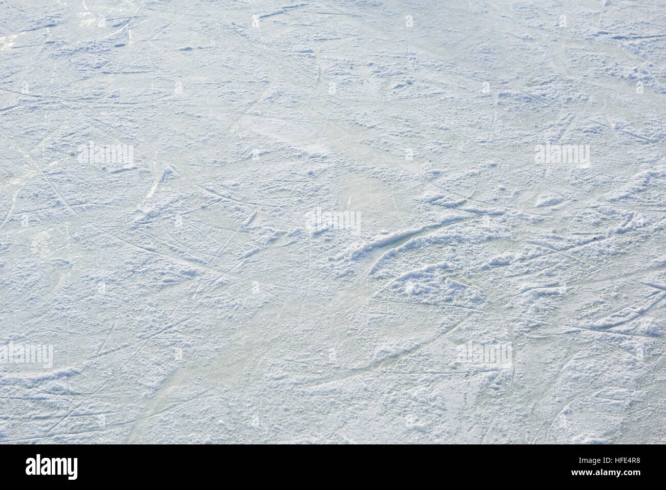 ice background with marks from skating and hockey, Ice rink floor ...