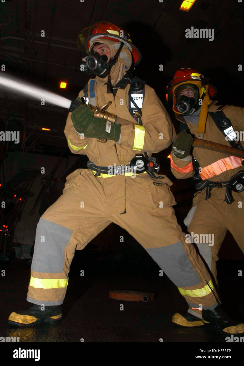 Charged fire hose hi-res stock photography and images - Alamy