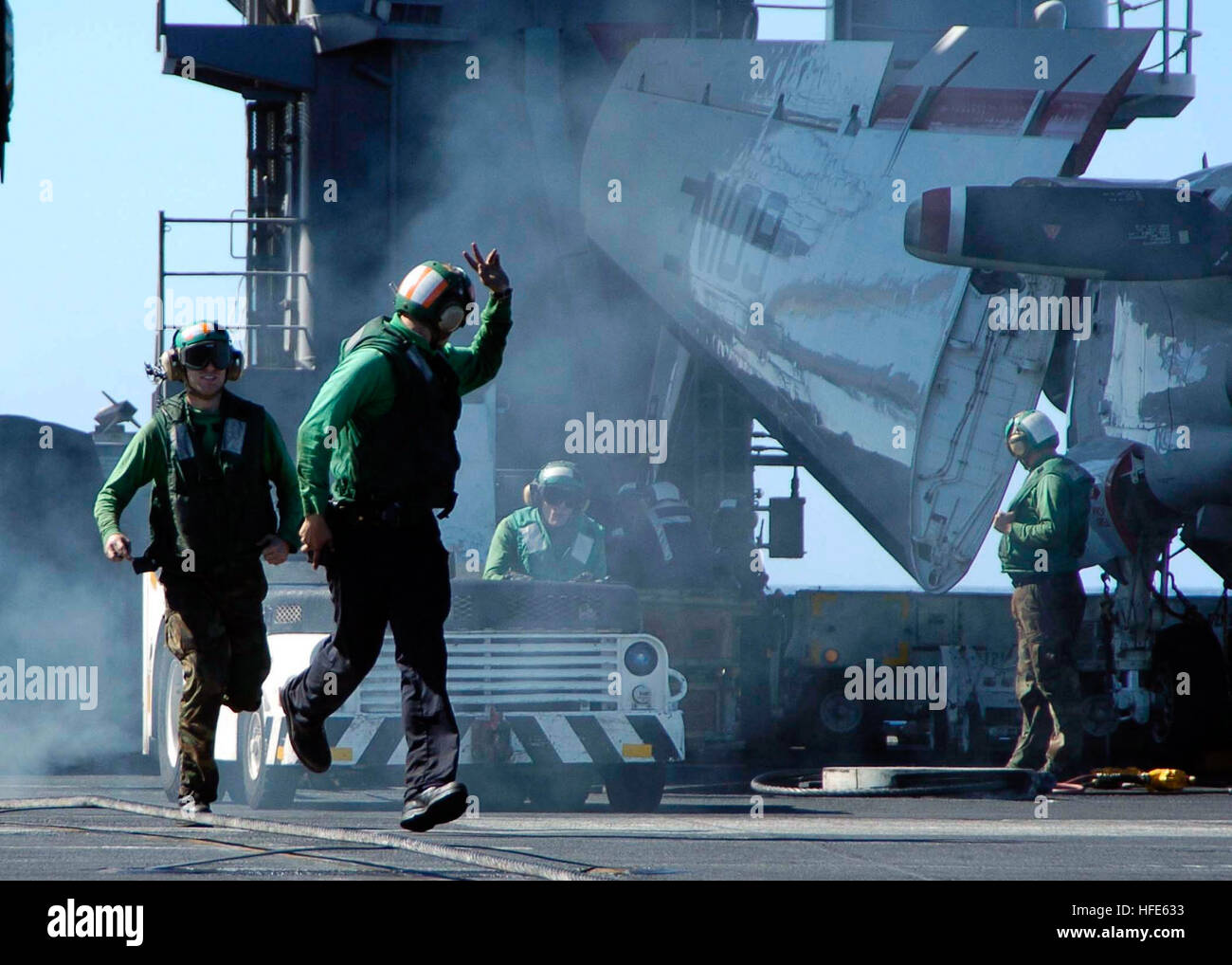 Us navy flight deck tractor hi-res stock photography and images - Alamy
