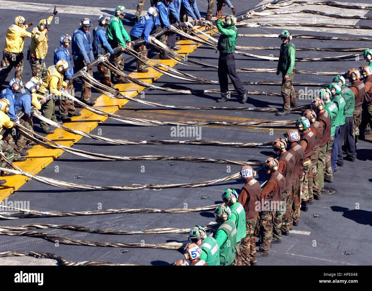 041118-N-5837R-111 Pacific Ocean (Nov. 18, 2004) - Crew members aboard ...