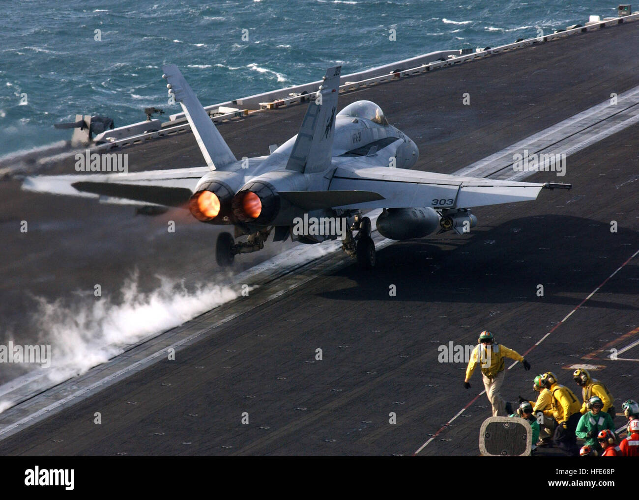 An F/A-18C Hornet from VFA-37 launches from a steam-powered catapult on ...