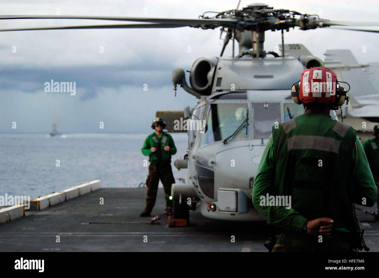 An SH-60B Seahawk of Helicopter Anti-Submarine Squadron Light 47 (HSL ...