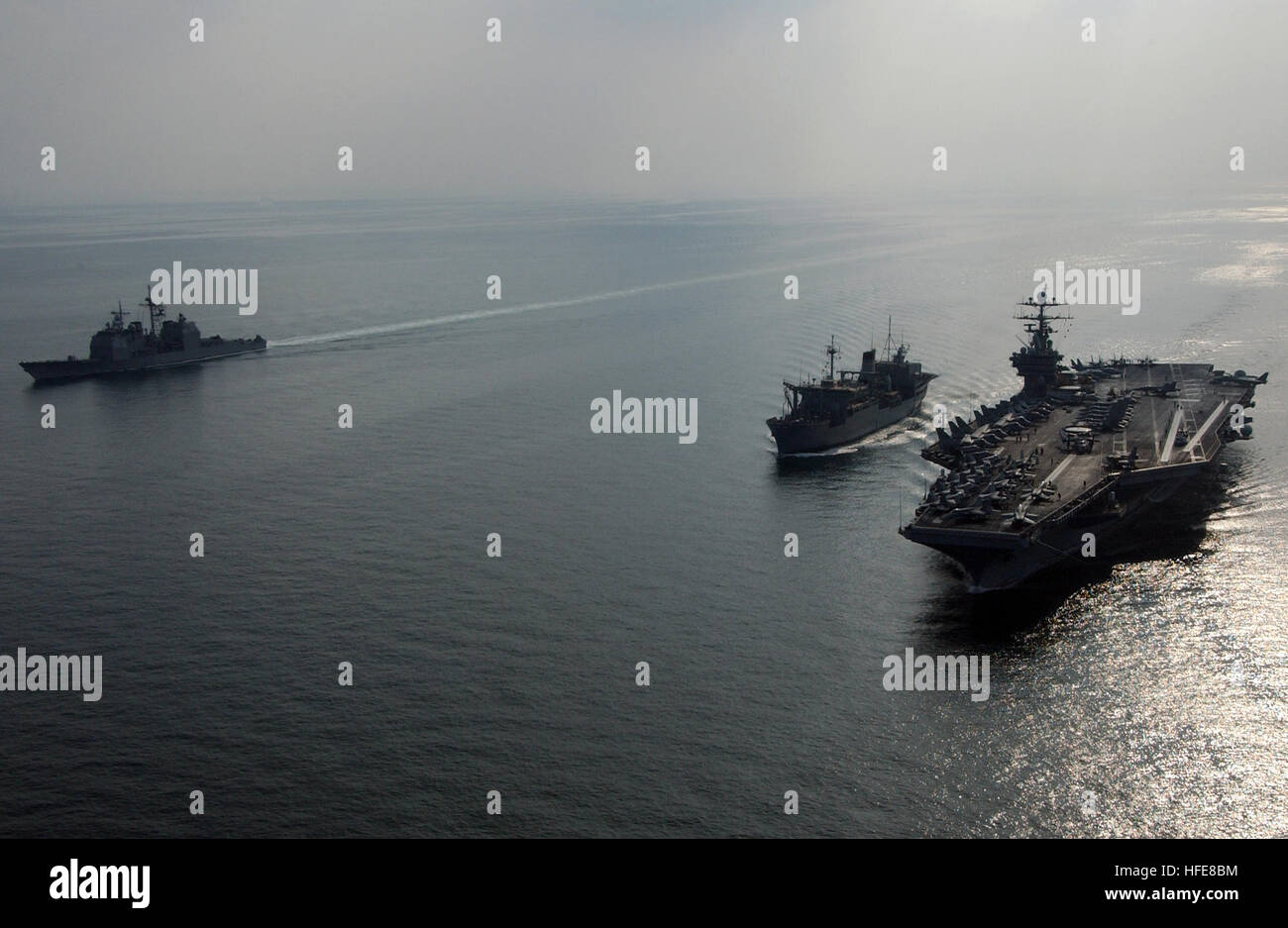 USNS Saturn conducts a VERTREP with USS Harry S. Truman and USS ...