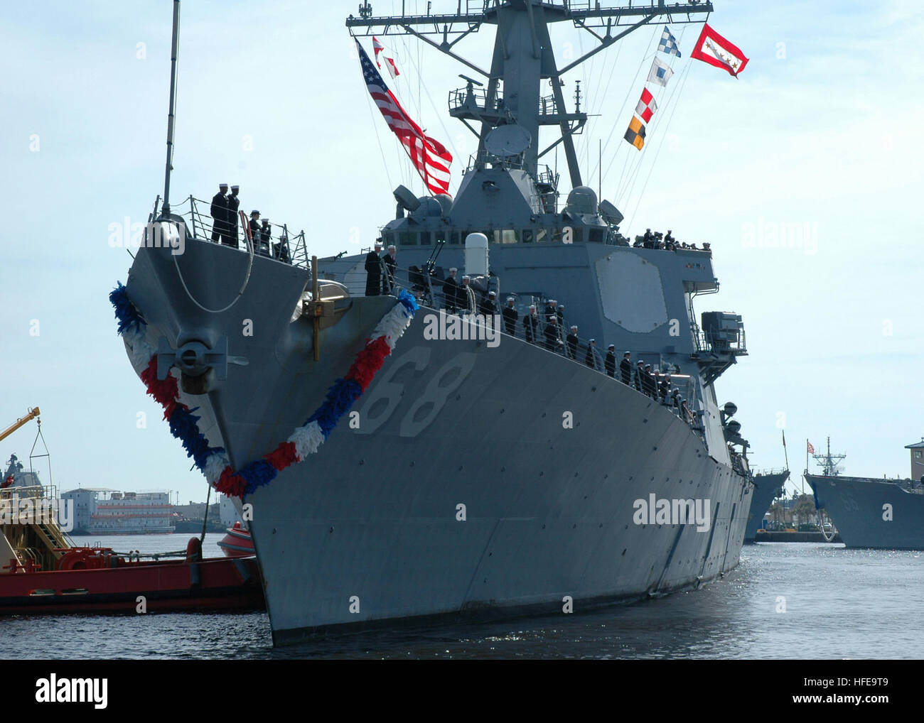Sailors man rails of guided missile destroyer USS The Sullivans (DDG 68 ...
