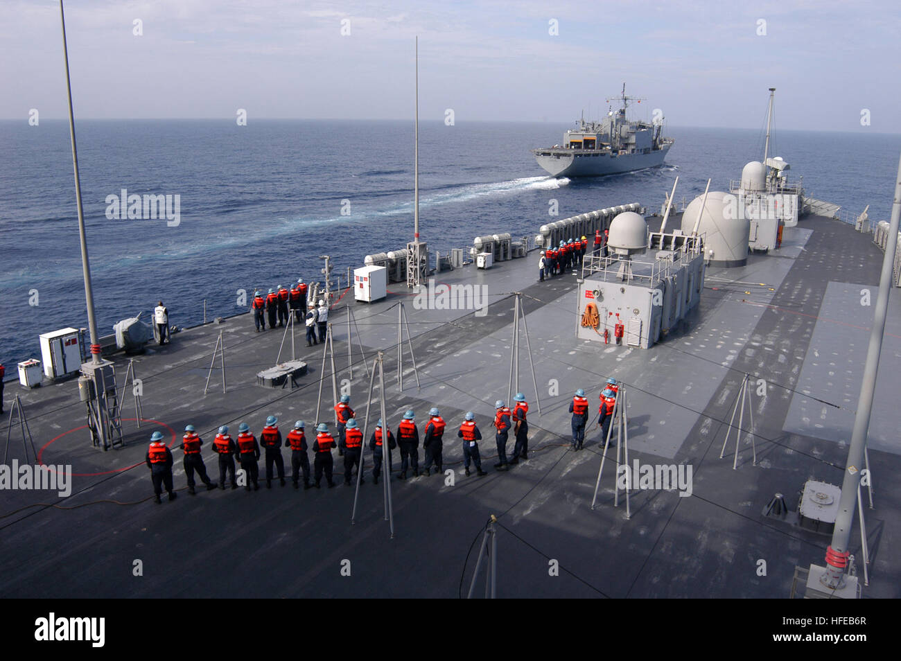 050322-N-9860Y-055 Philippine Sea (Mar. 22, 2005) Ð Crew members aboard ...