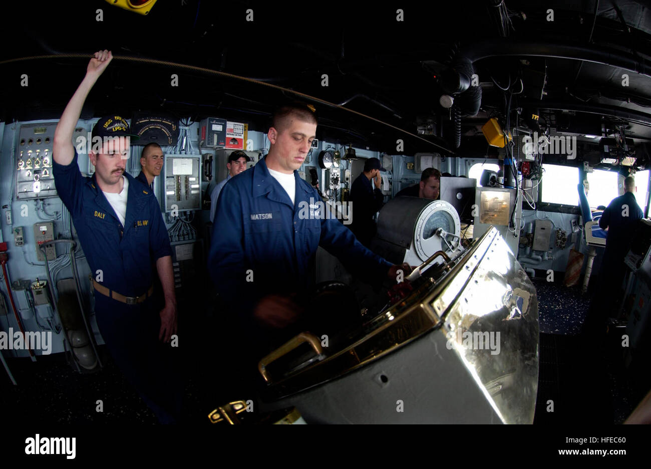 Helm Safety Officer monitors helmsman during routine underway ...