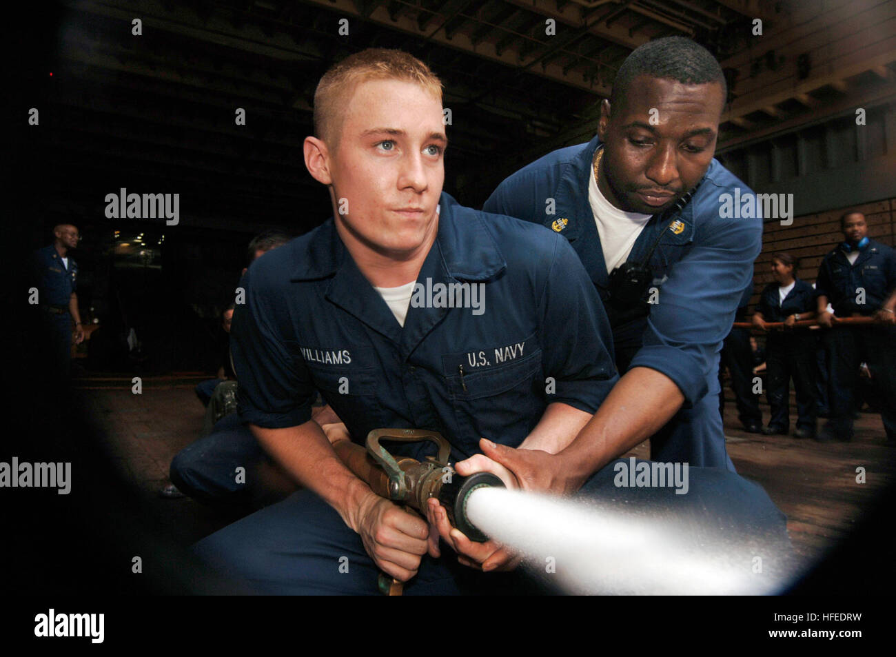 Fire hose handling techniques hi-res stock photography and images - Alamy