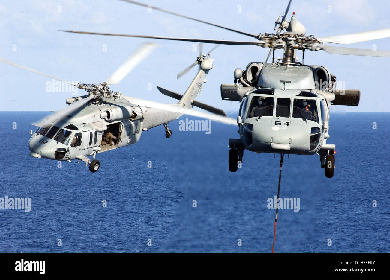 Two MH-60S Knighthawk helicopters from Helicopter Composite Squadron ...