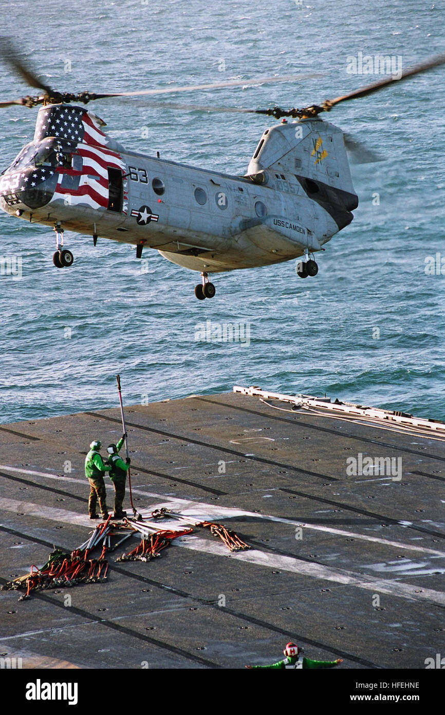 030328-N-5292M-011 The Arabian Gulf (Mar. 28, 2003) -- Sailors attach a ...