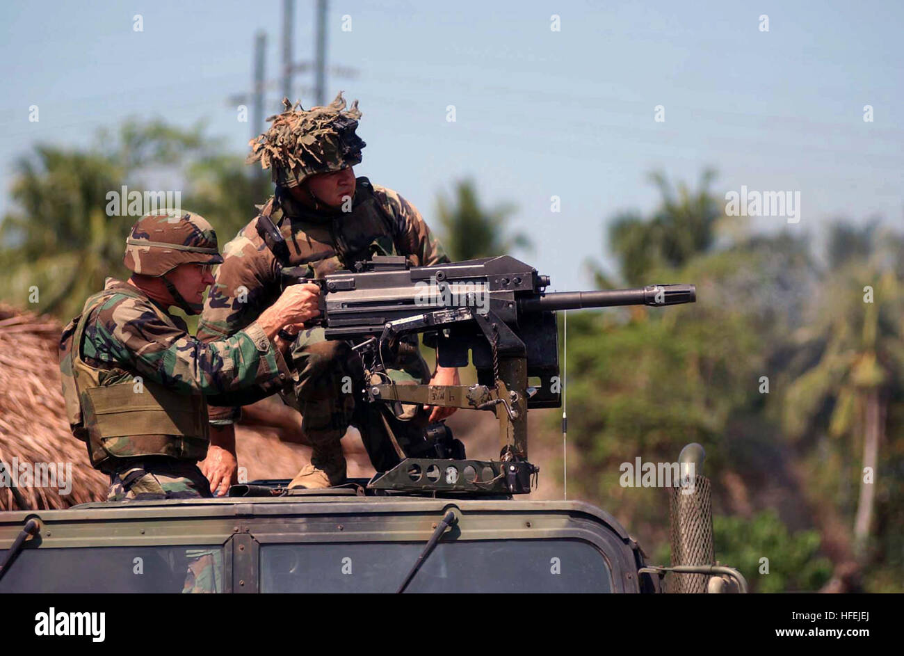 Personnel from JSOTF-P conduct live-fire training with a Mark-19, 40mm ...