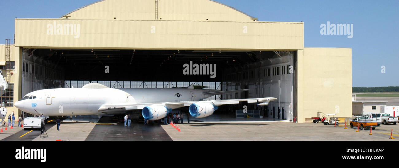An E-6B Mercury aircraft is moved into a hangar at Cecil Field, Florida ...