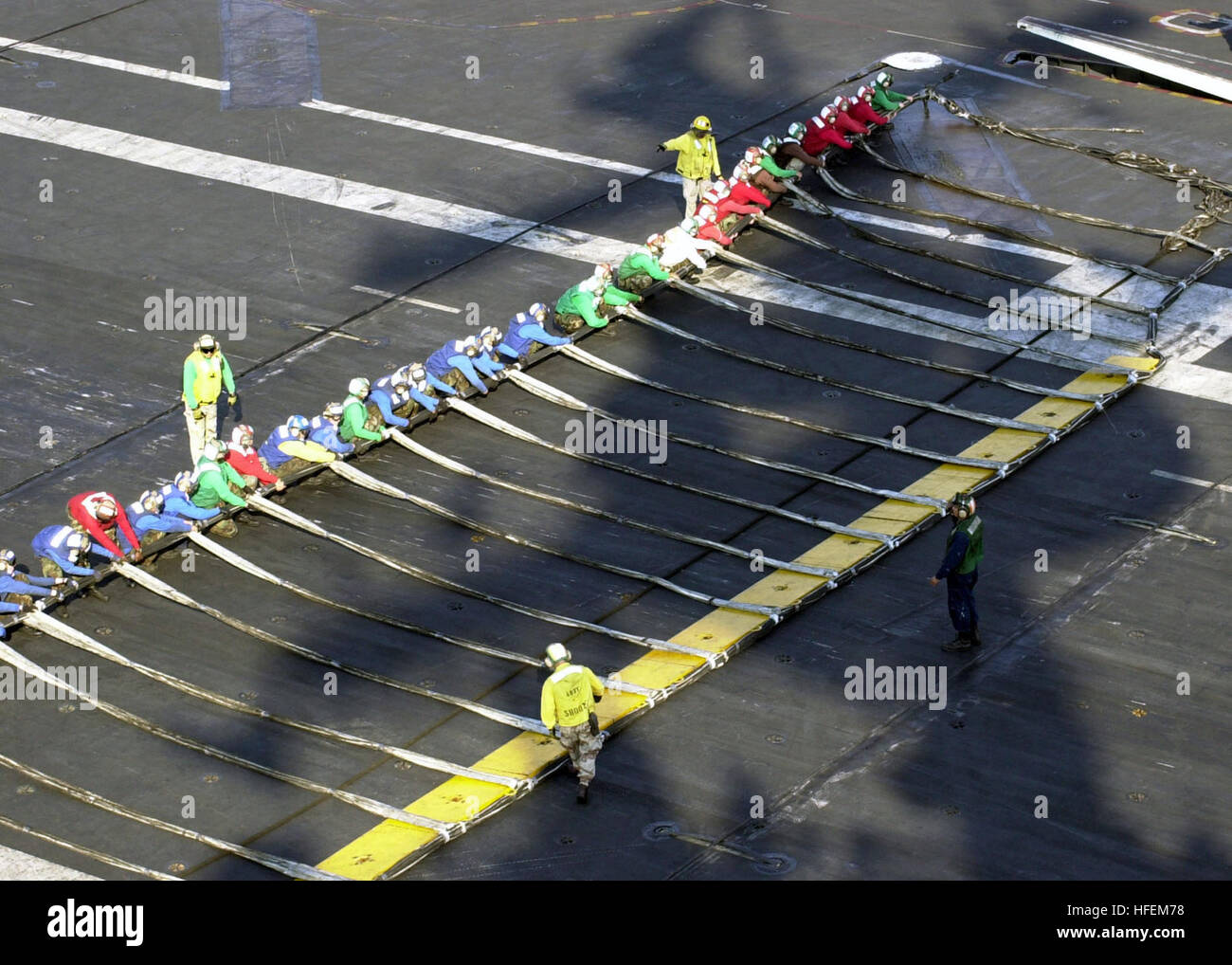 030625-N-0119G-002 Atlantic Ocean (Jun. 25, 2003) -- Sailors assigned ...