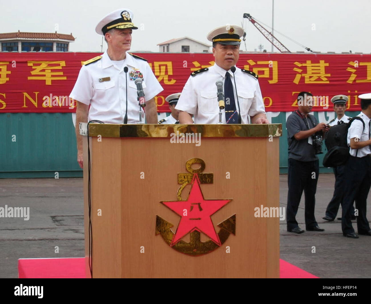 030922-N-0000B-987 Zhanjiang, China -- Rear Adm. James D. Kelly, left ...