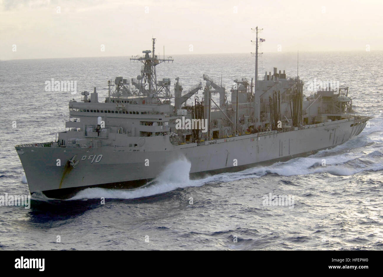 031026-N-4284T-001 Western Pacific Ocean (Oct. 26, 2003) -- USS Bridge (AOE 10) steams behind ...