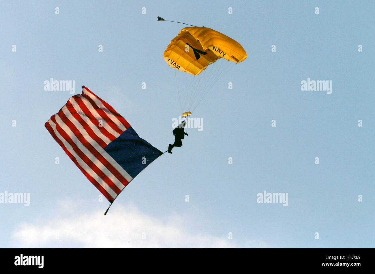 A Navy SEAL from the U.S. Navy Leap Frogs parachute team performs a ...