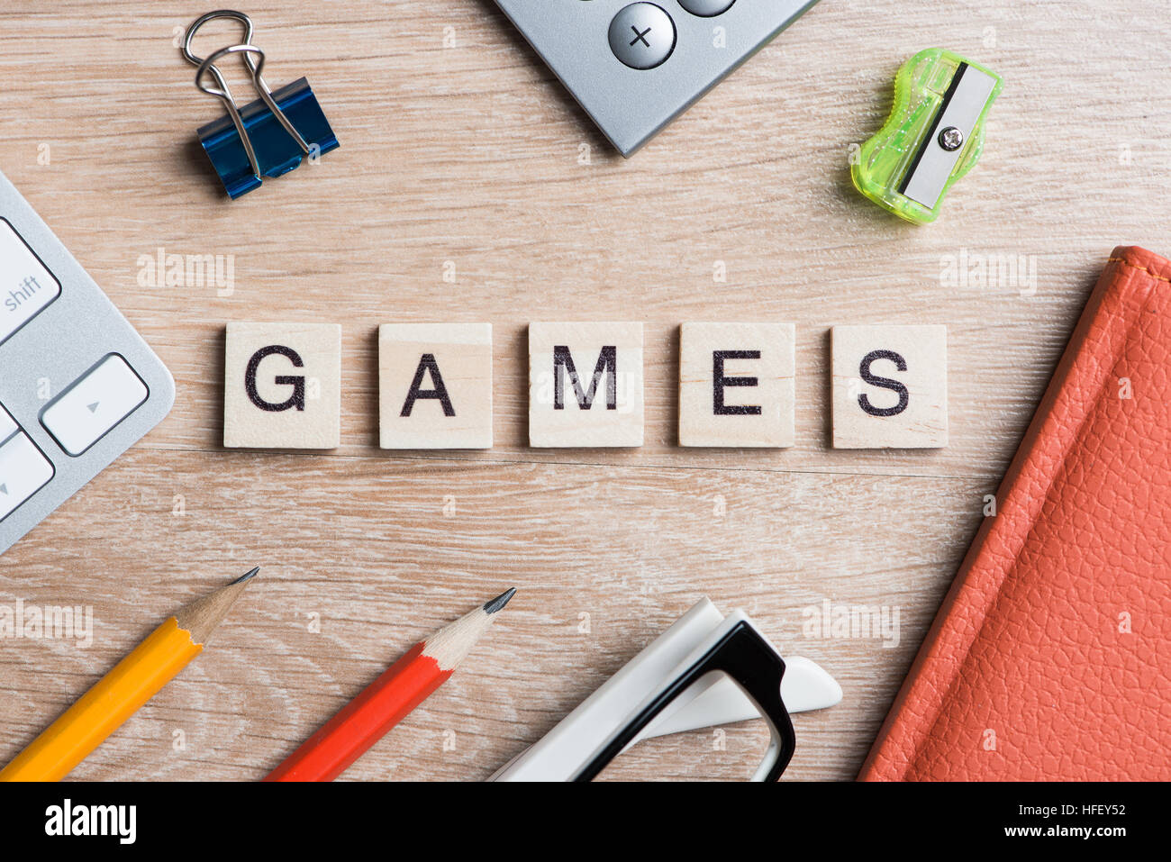 Elements of education game spelling words on wooden office table Stock ...