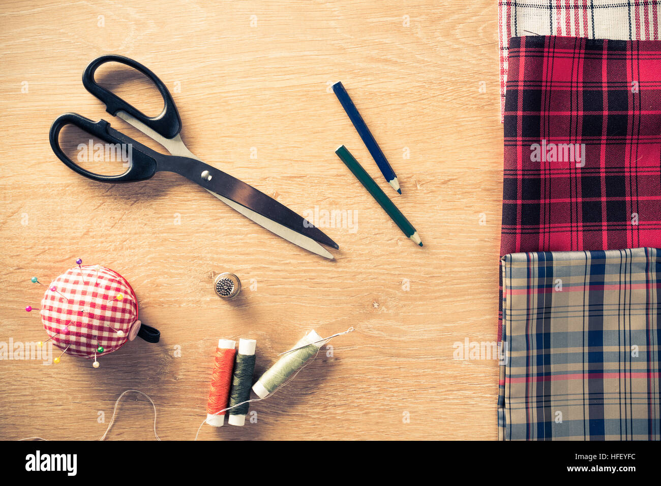 Sewing kit on table Stock Photo - Alamy