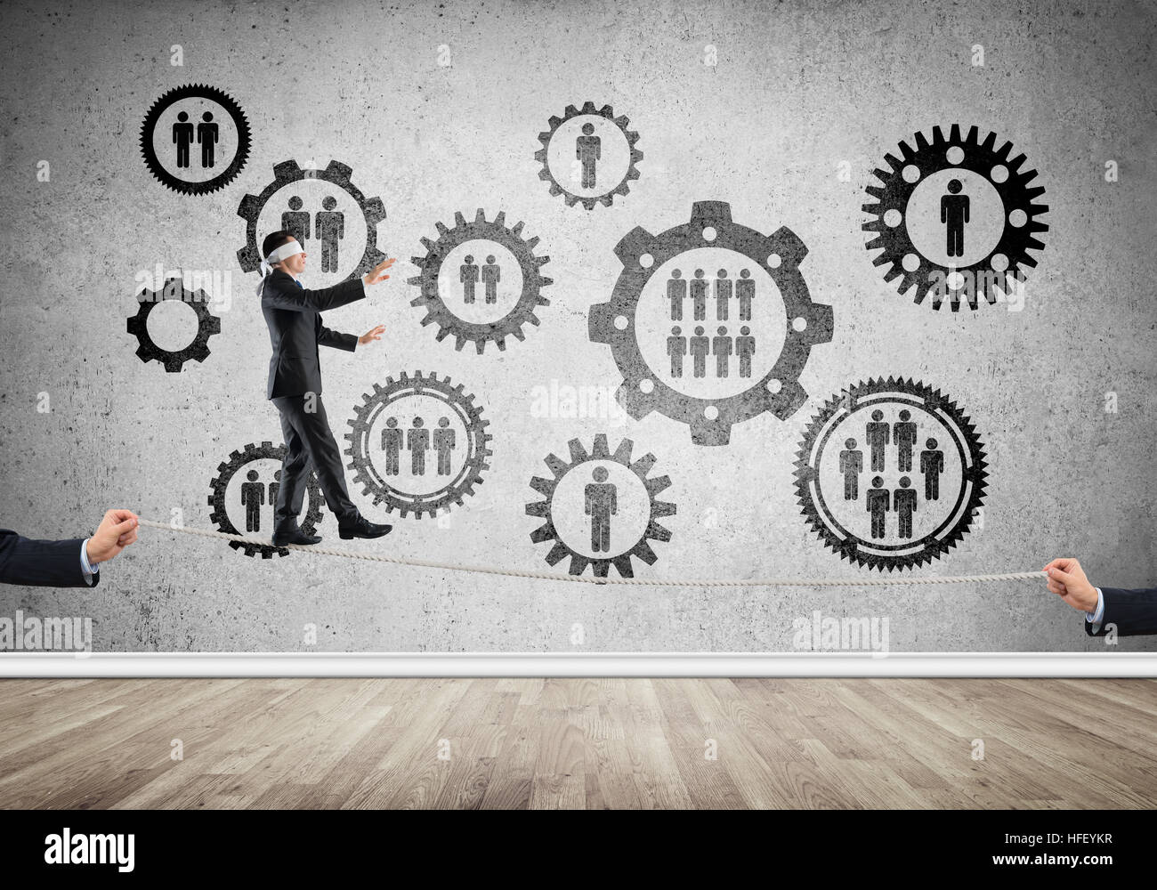 Business concept of risk support and assistance with man balancing on ...