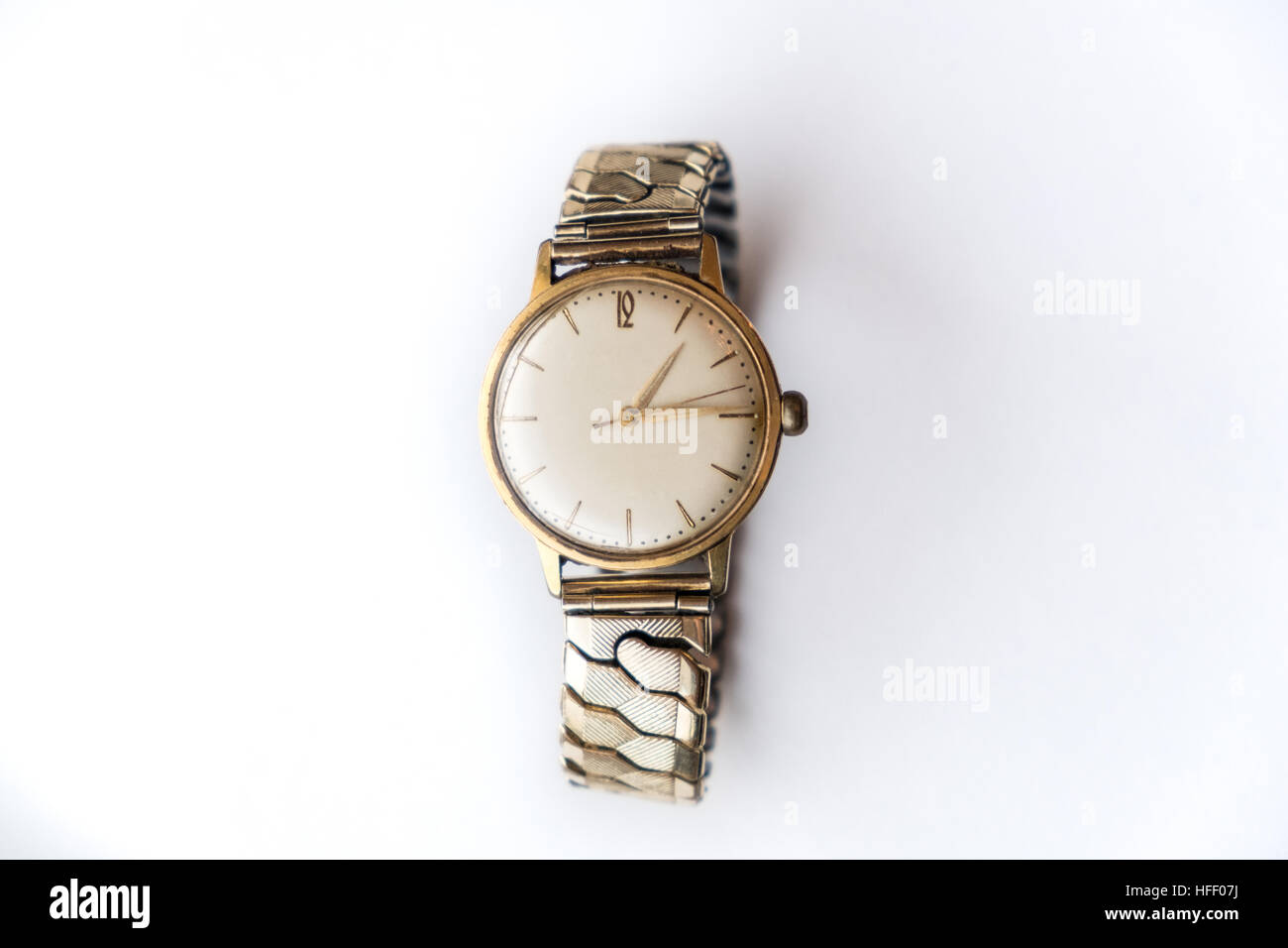 old golden watch isolated on white background Stock Photo - Alamy