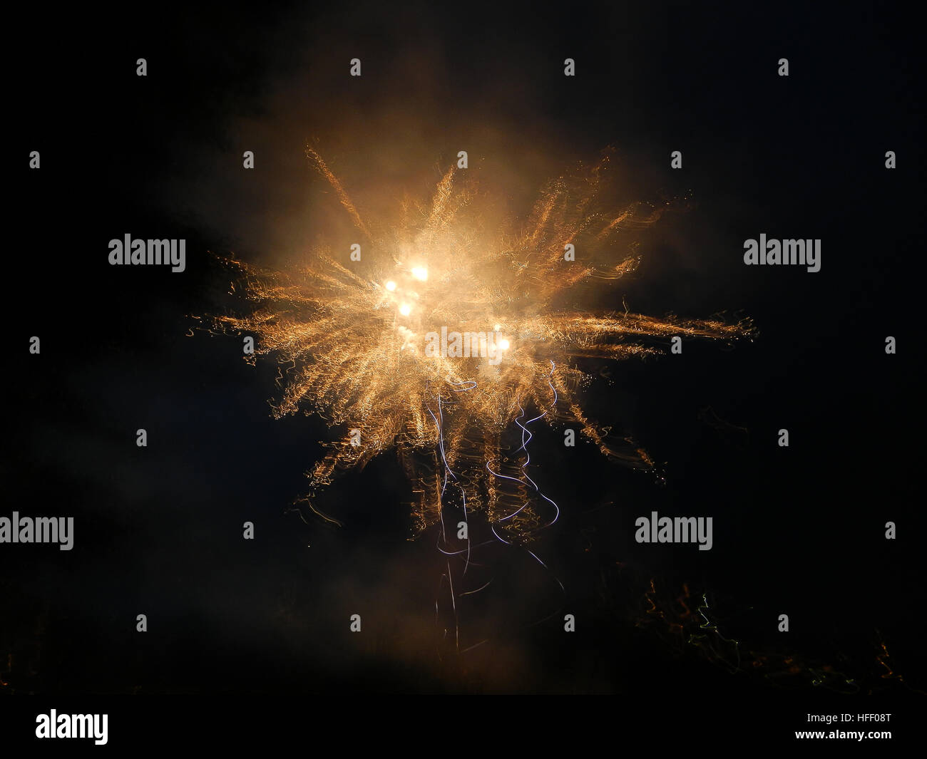 Colorful shiny firework at dark night holiday Stock Photo - Alamy