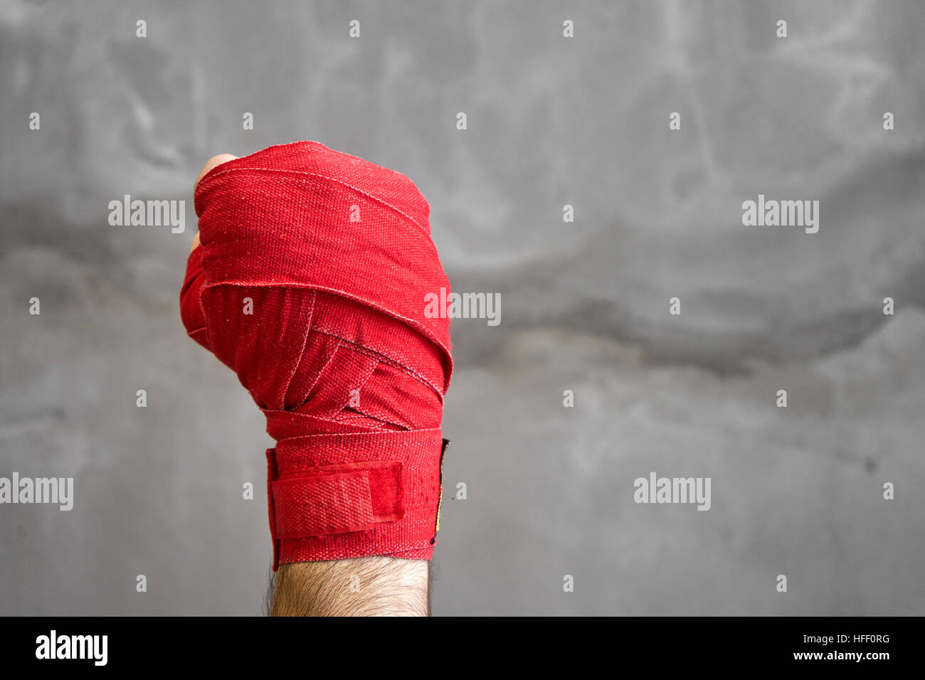 Cropped shot of a boxer's hand wrapped with red boxing tape Stock Photo ...