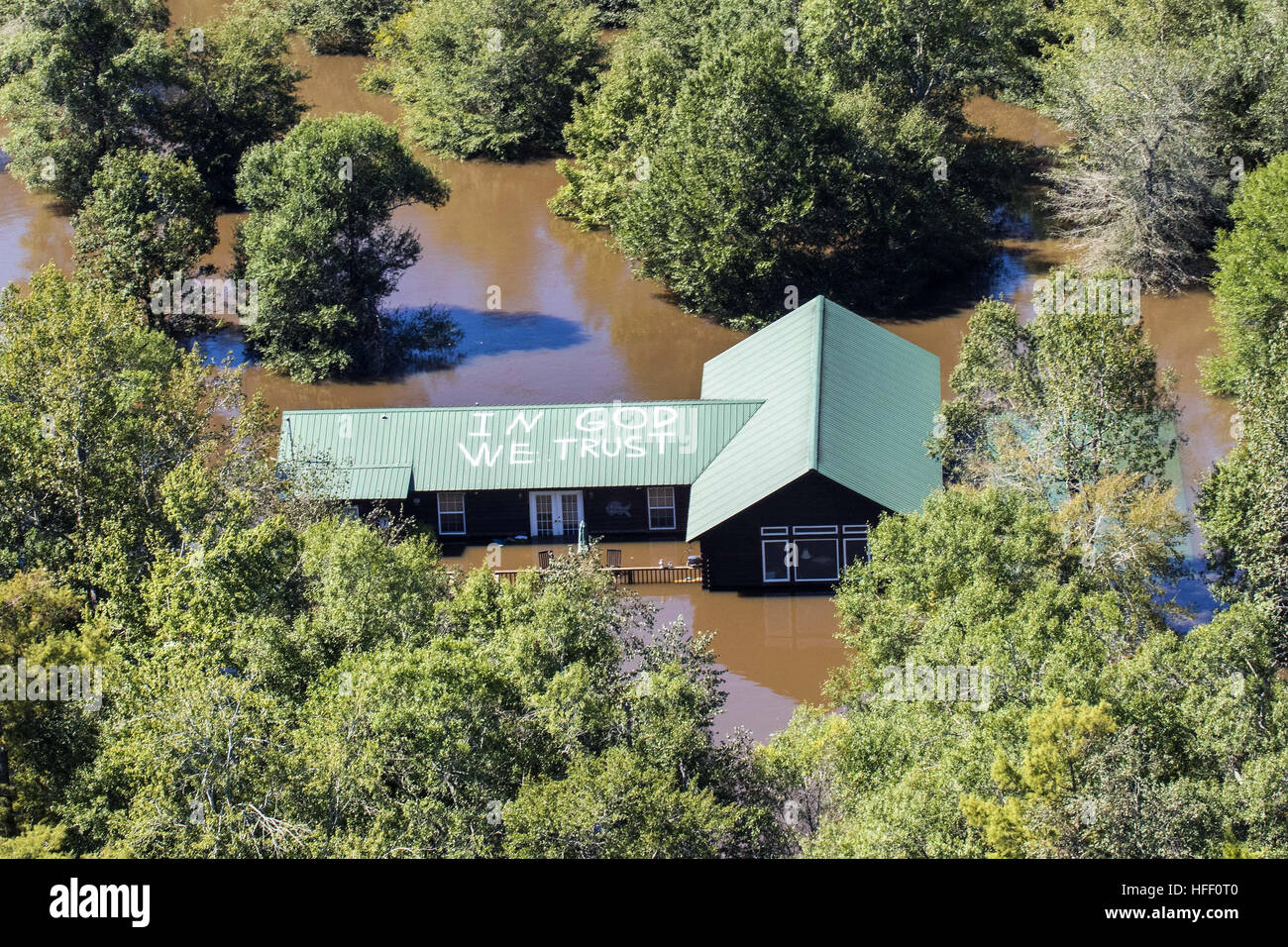 Aerial view of a house submerged in flood water after a hurricane hit ...