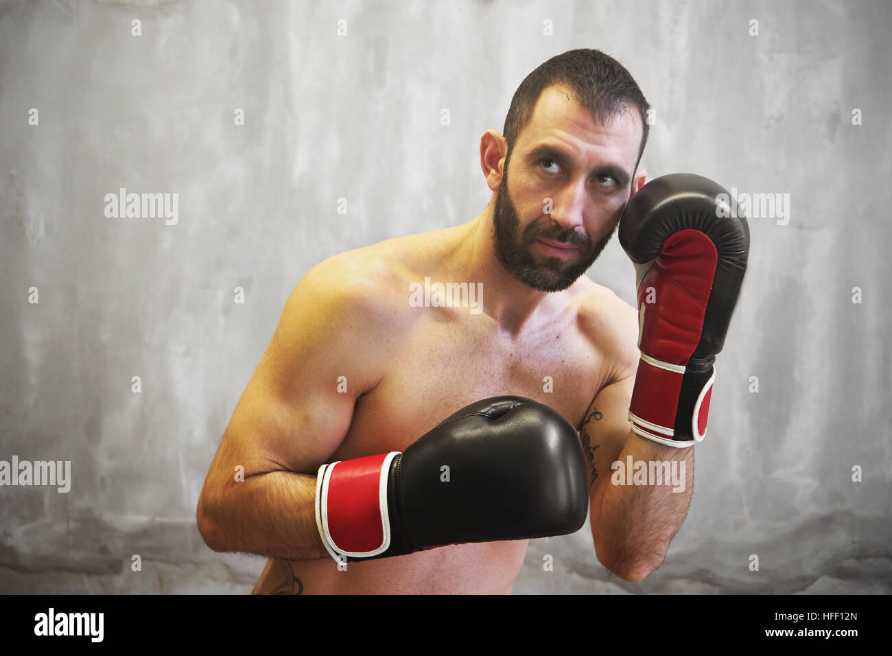 Boxing man ready to fight Stock Photo - Alamy