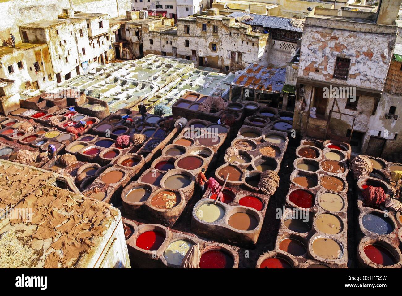 Aerial View of Men Working and Living in Poverty. Colorful Leather ...