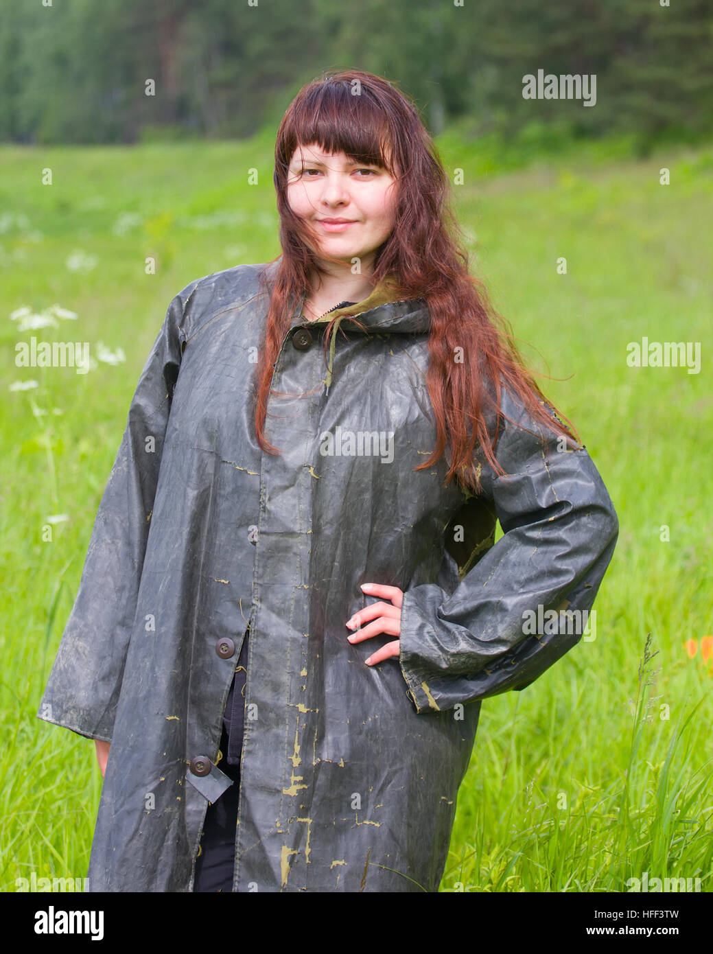 old ragged clothes. girl in a vintage coat chemical protection used in ...