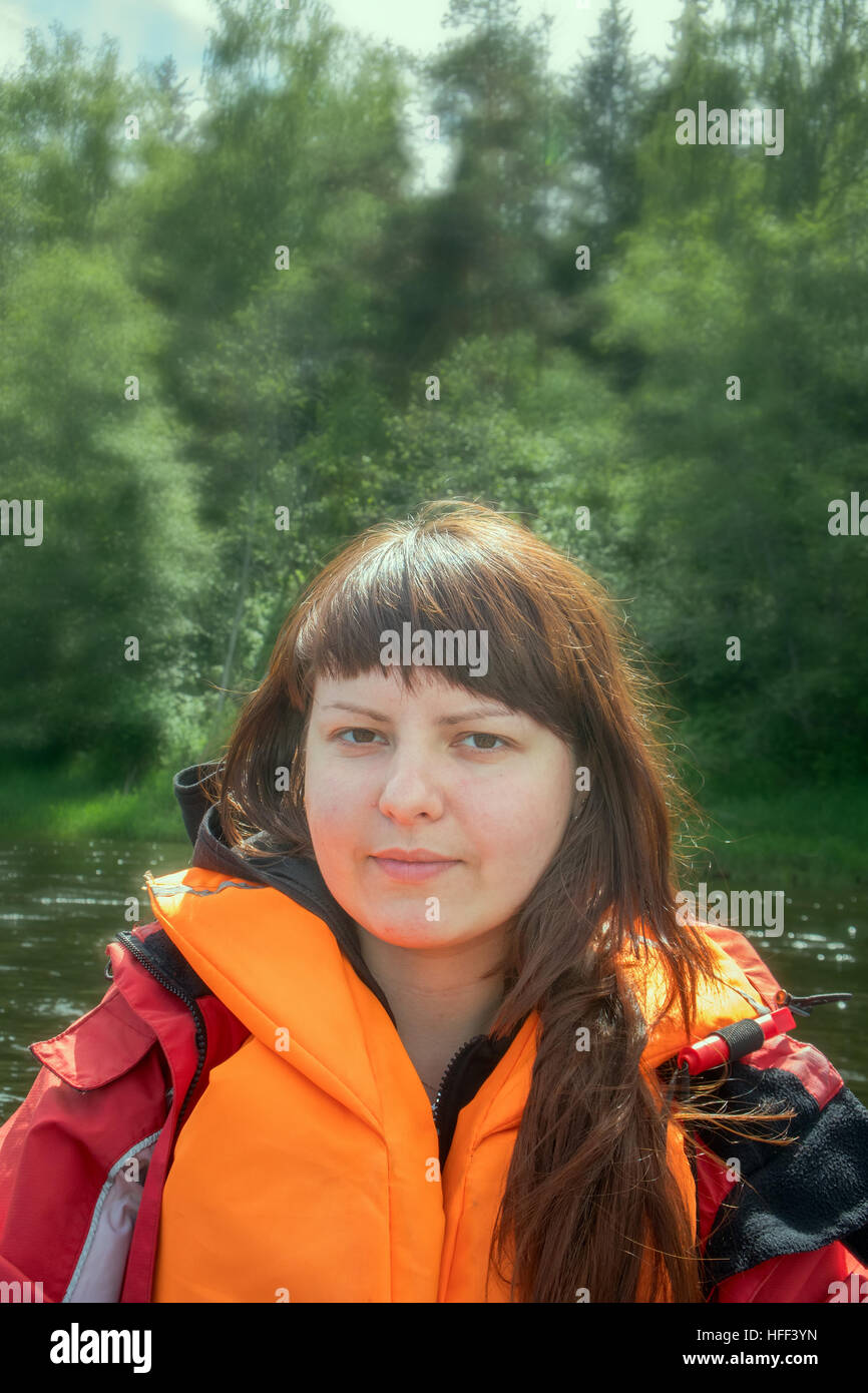 instructor guide recreation tours on beautiful European river. Girl in ...