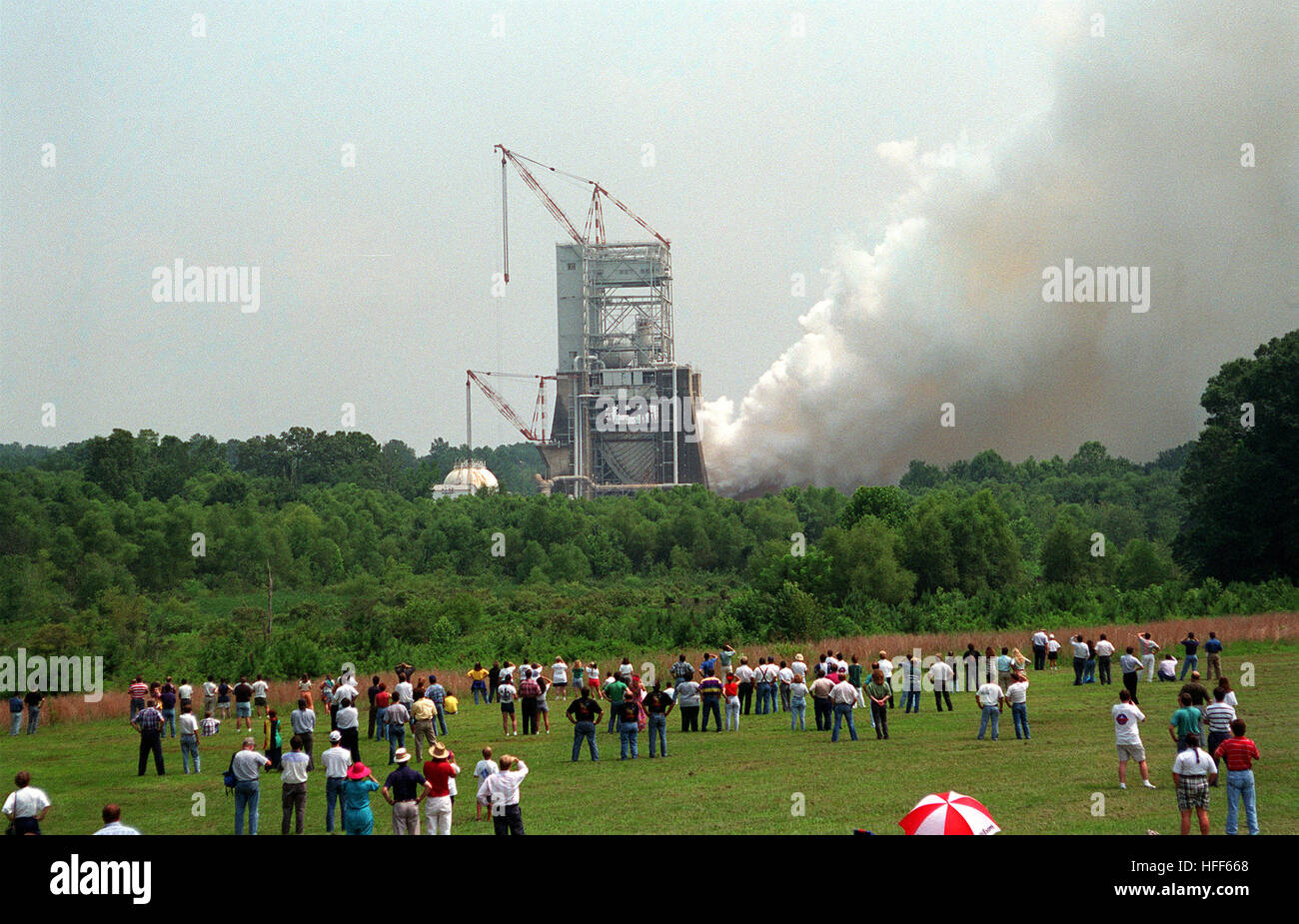 A test firing of the Space Shuttle's main engine demonstrates the ...