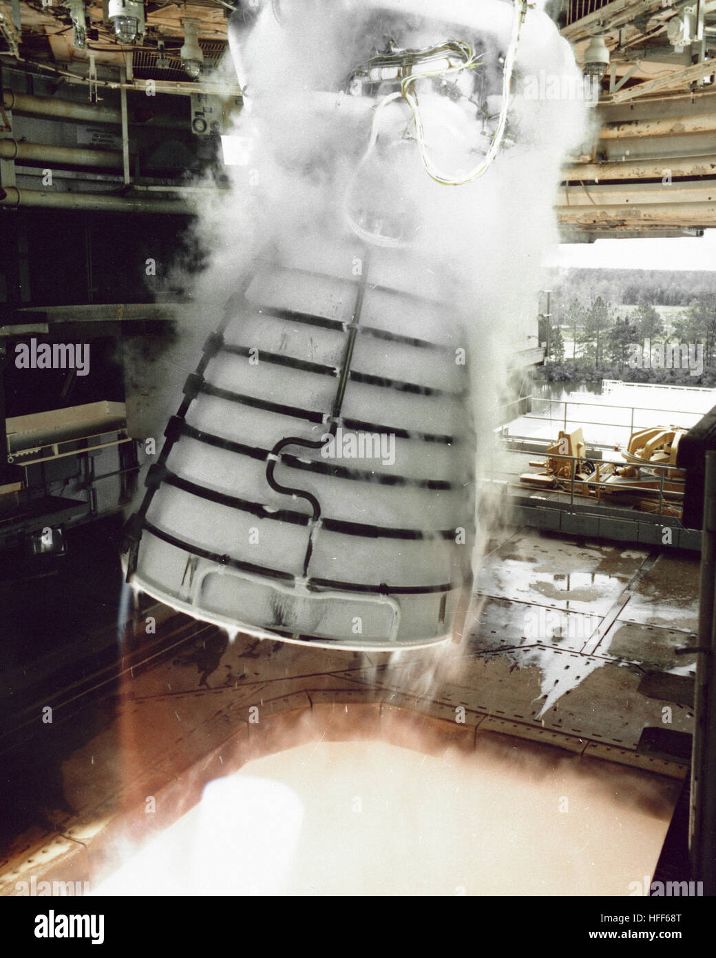 The Space Shuttle main engines undergo a gimbal test to simulate the ...