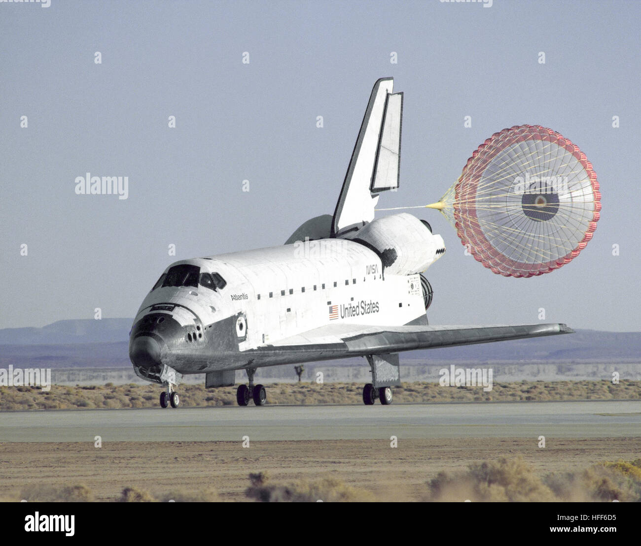 The Space Shuttle Atlantis lands at Edwards Air Force Base, deploying ...