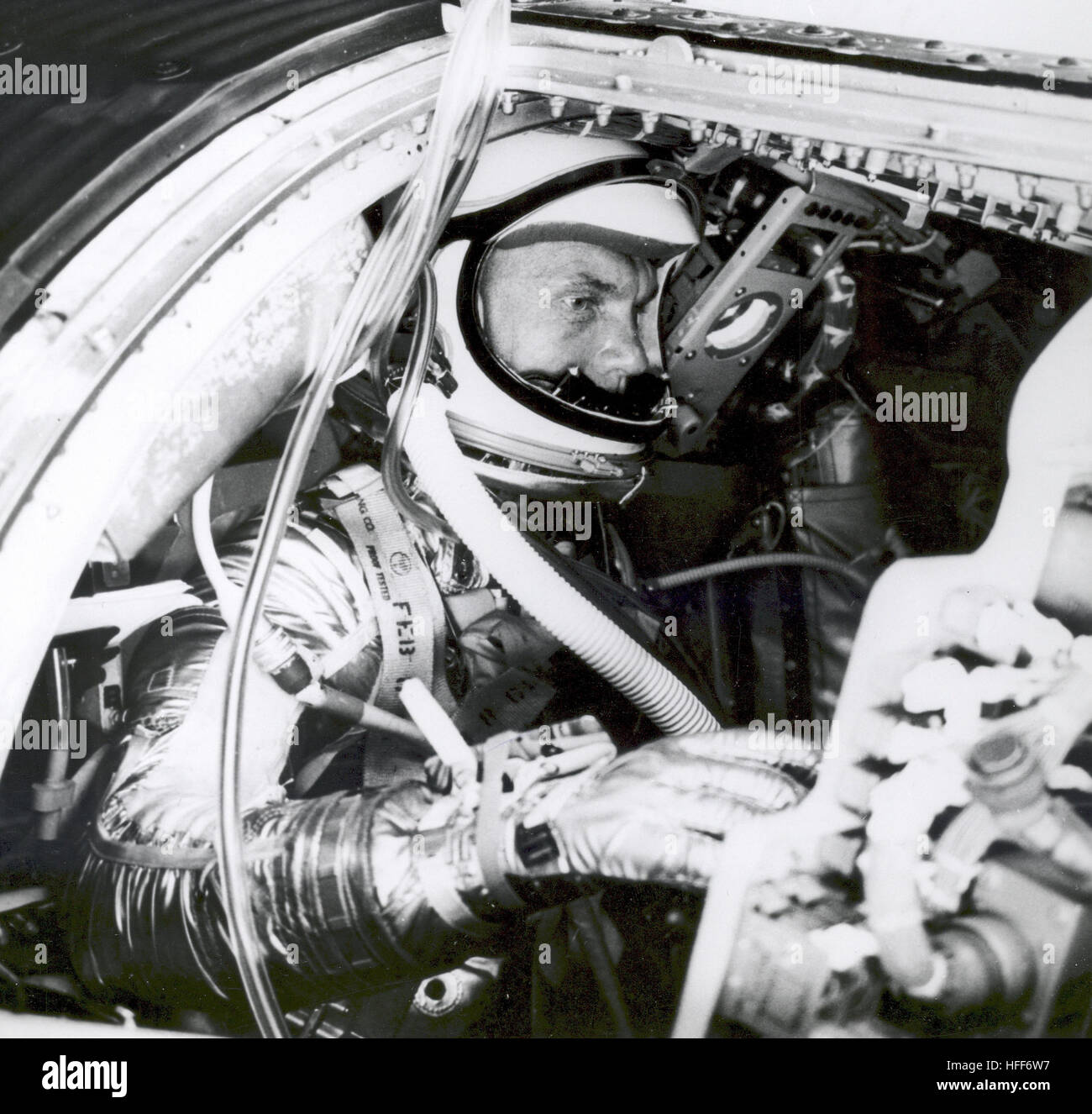 Astronaut John Glenn is seen in a simulated flight training session ...