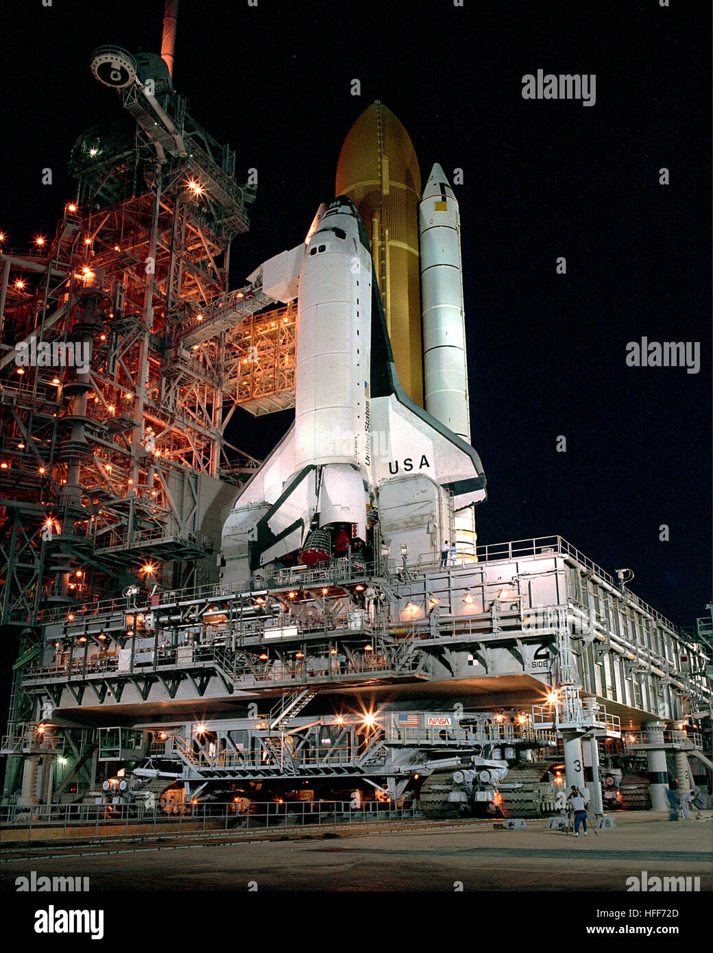 The Space Shuttle Columbia is seen rolling out of the Vehicle Assembly ...
