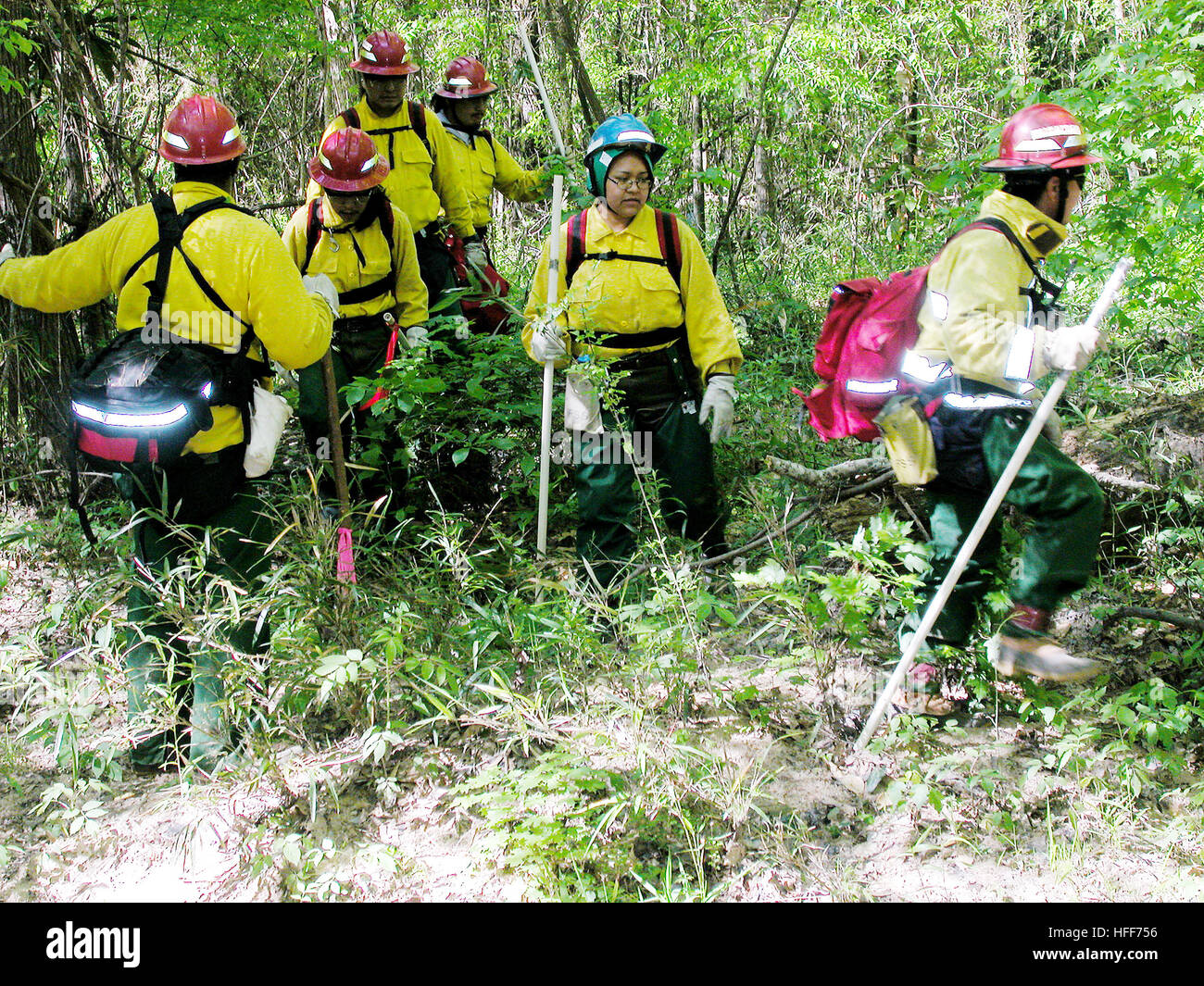 NASA workers search for debris from the Columbia Space Shuttle disaster ...