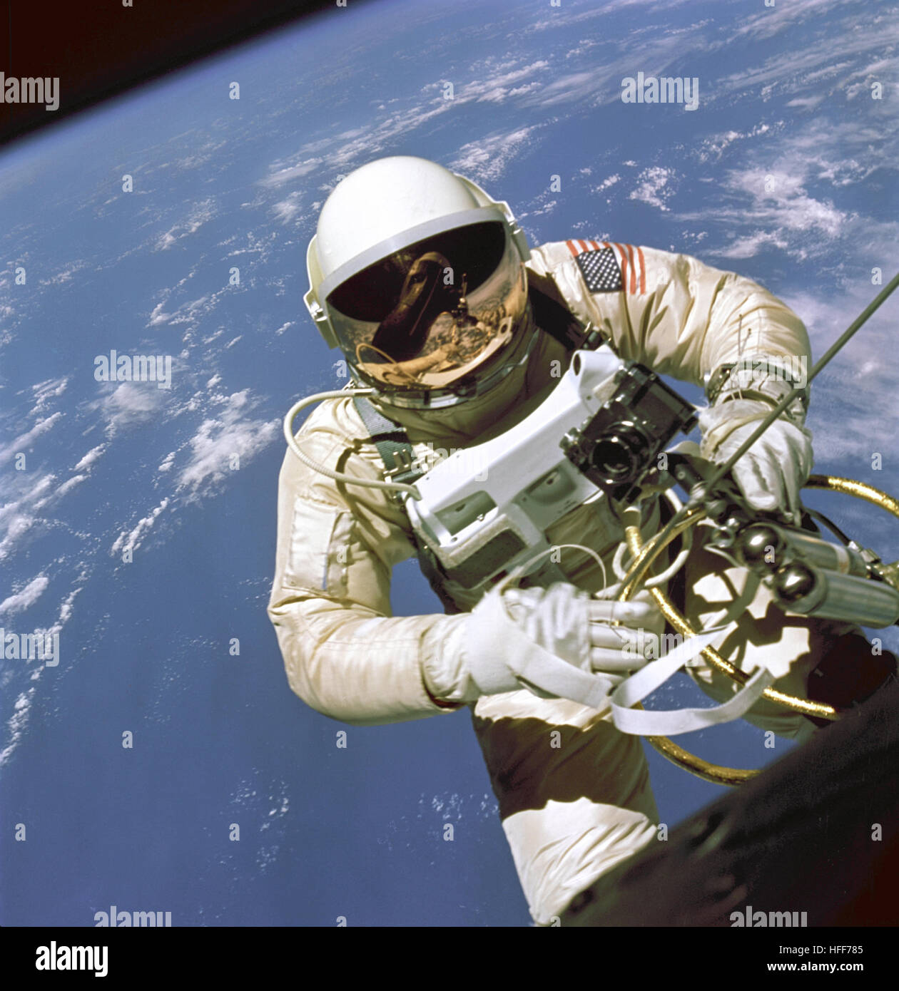 Edward White becomes the first American to walk in space during the ...