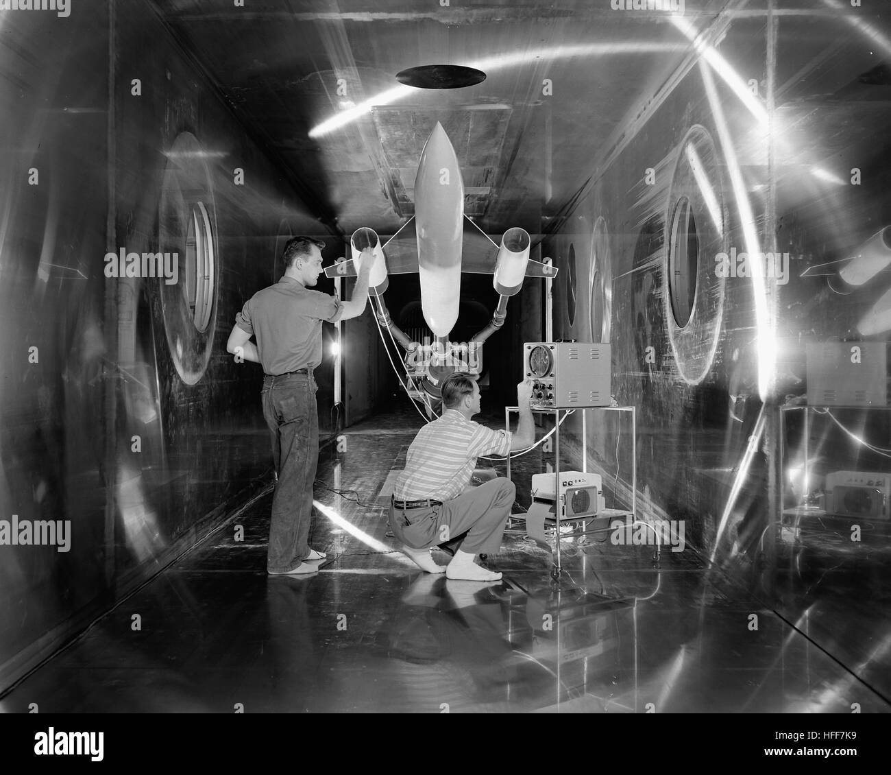 Engineers inspect the body revolution model, a crucial part of ...