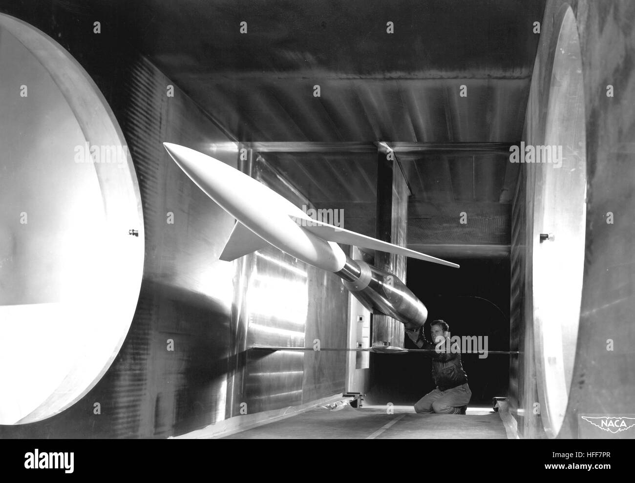 A model aircraft is tested in a supersonic wind tunnel to evaluate its ...