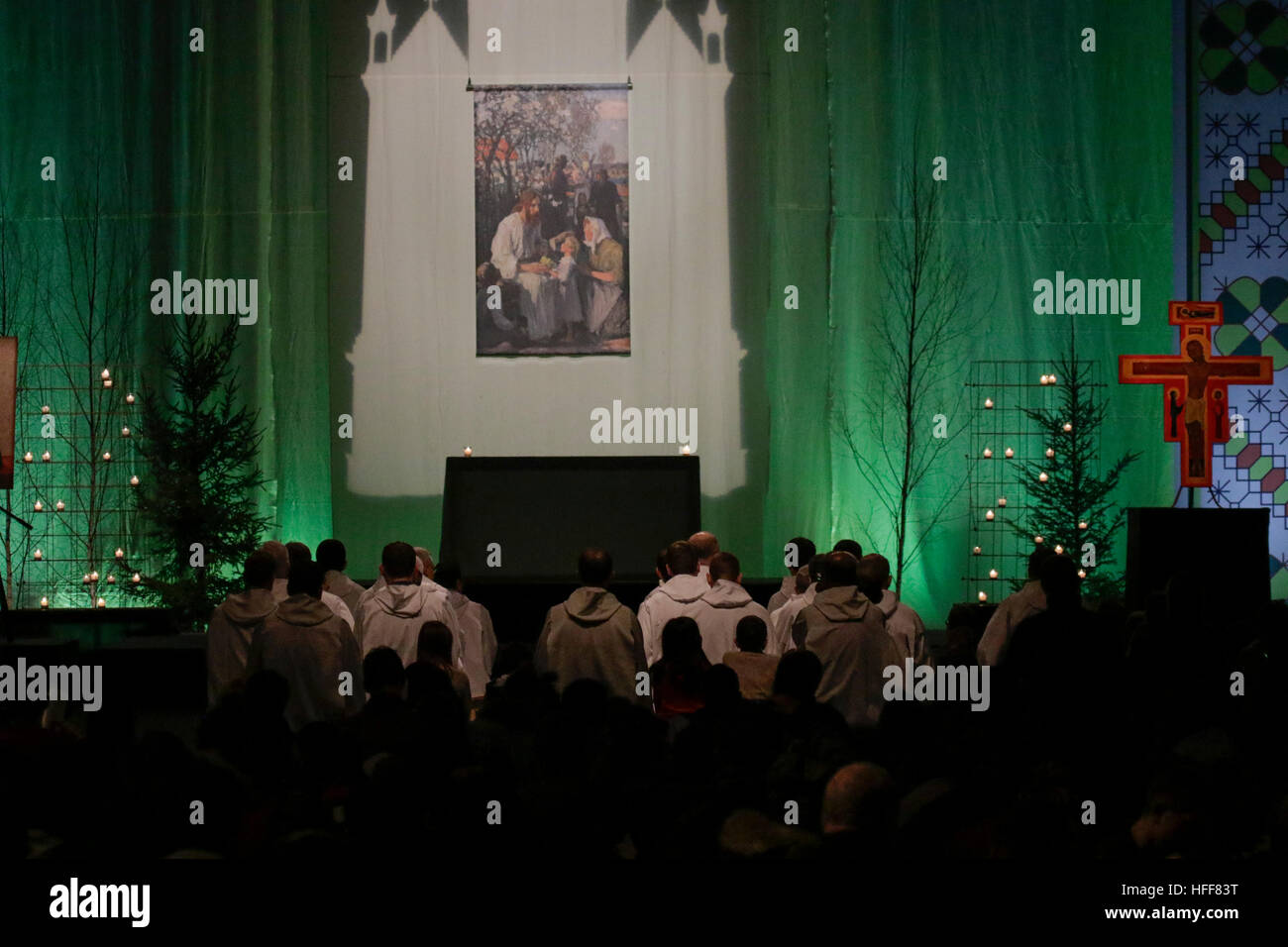 Latvia. 29th Dec, 2016. The brothers of Taize sit in front of the altar ...