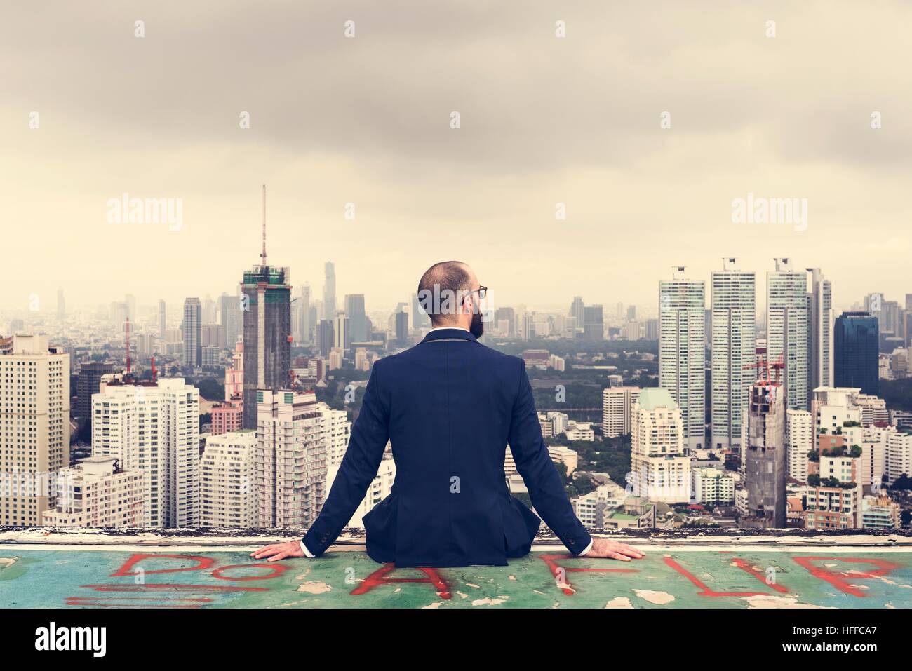Business Person Sitting Rooftop Concept Stock Photo - Alamy