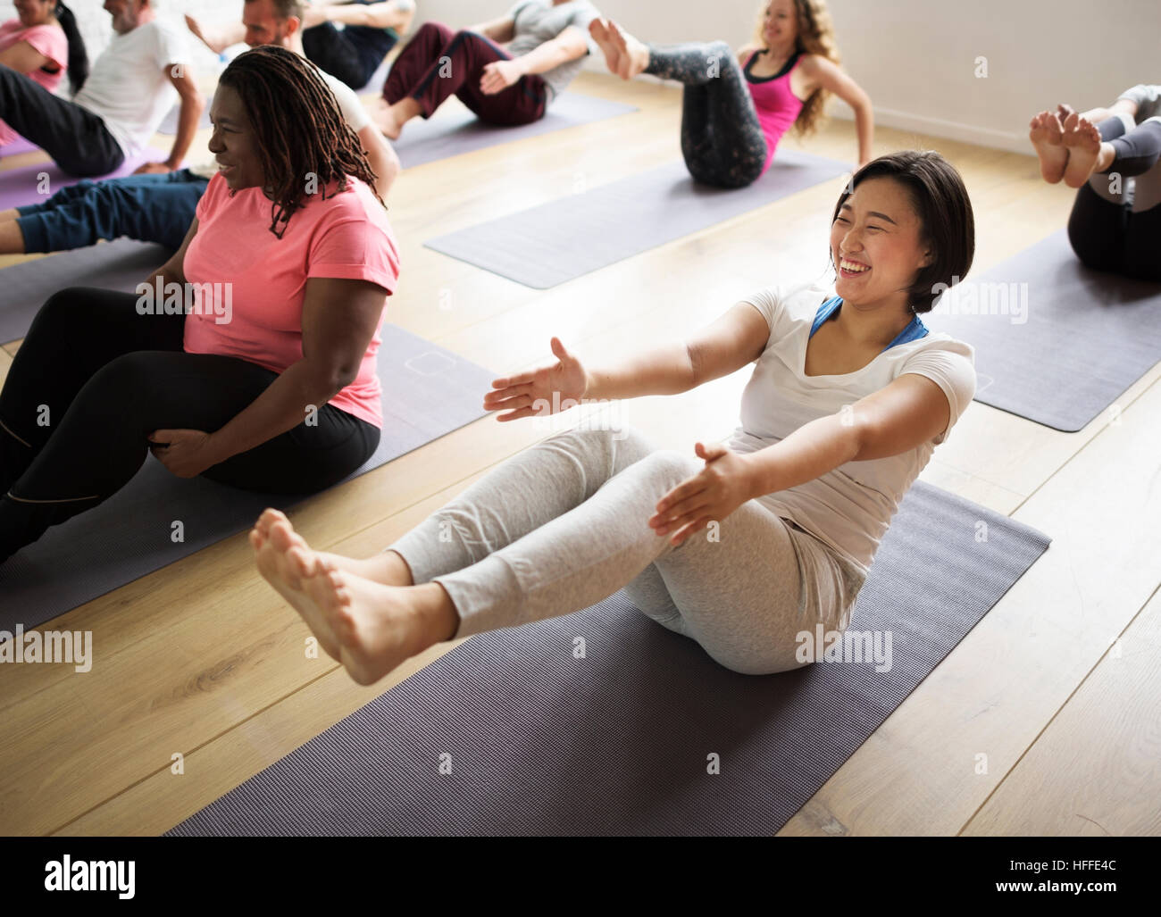 Exercise International Group Relaxation Fitness Concept Stock Photo - Alamy