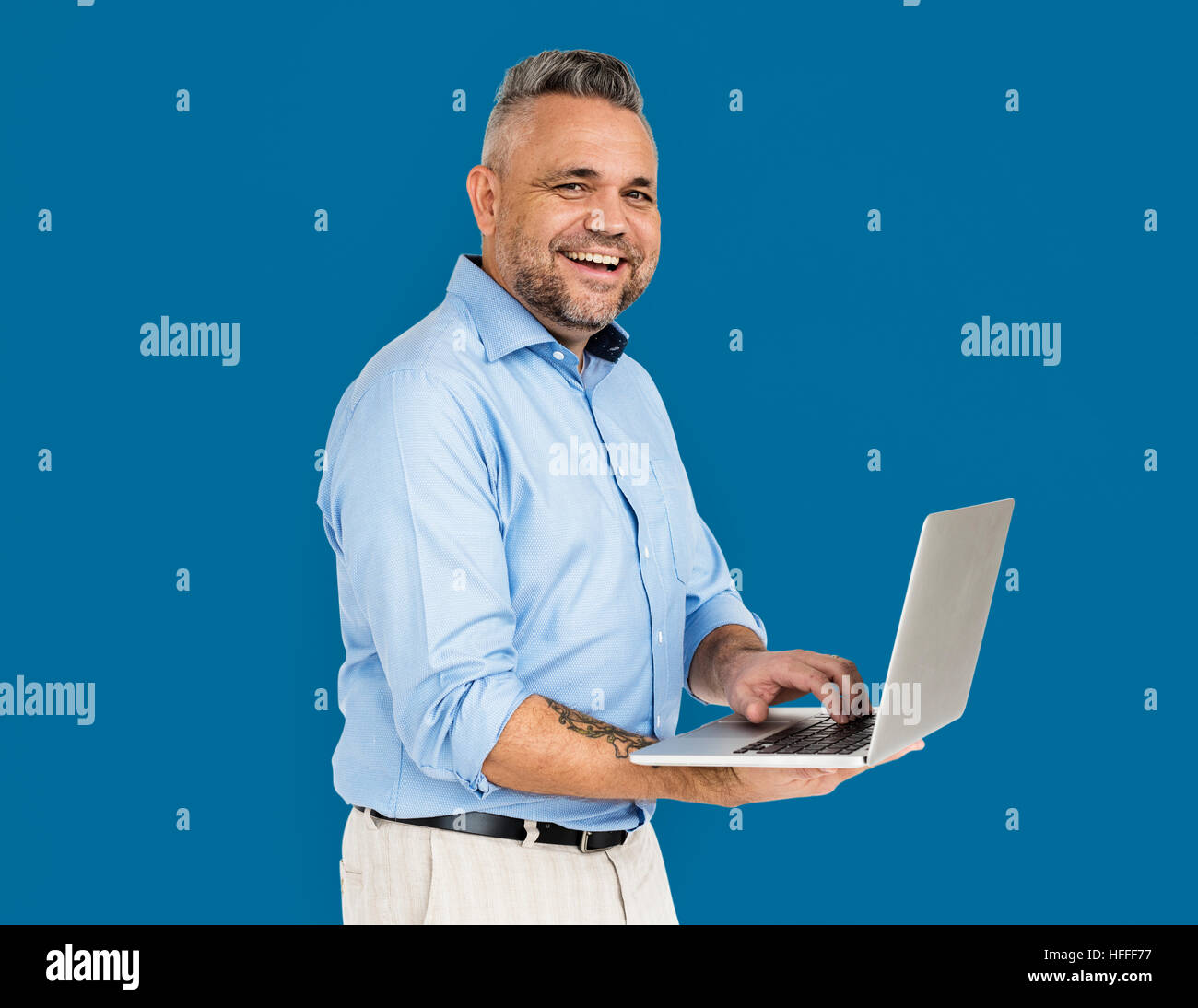Cheerful Man Technology Gadget Concept Stock Photo - Alamy