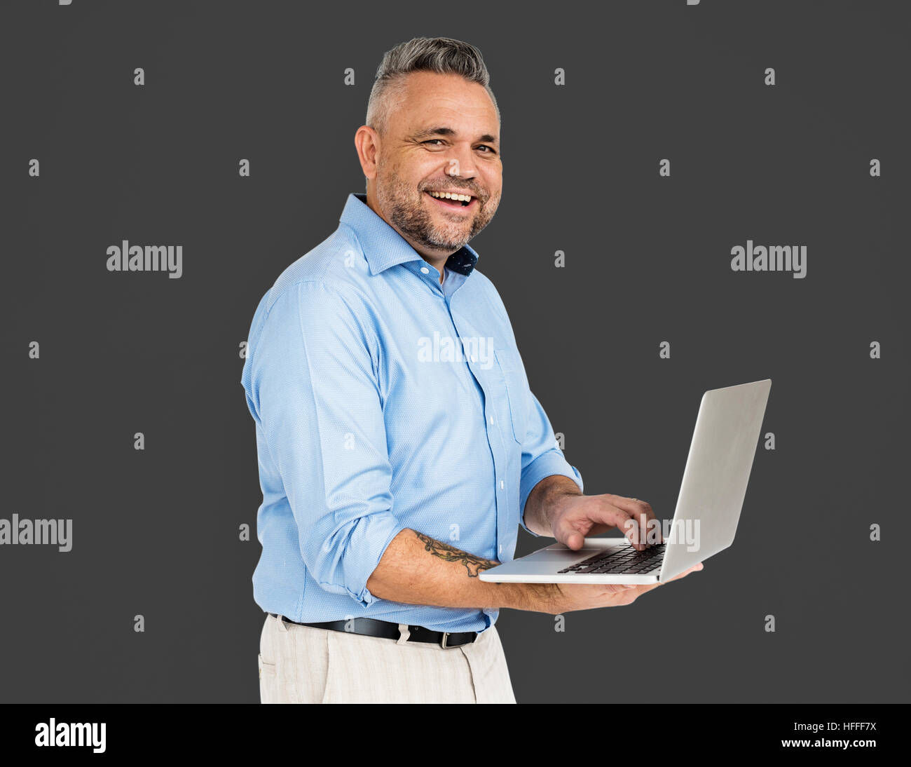 Cheerful Man Technology Gadget Concept Stock Photo - Alamy