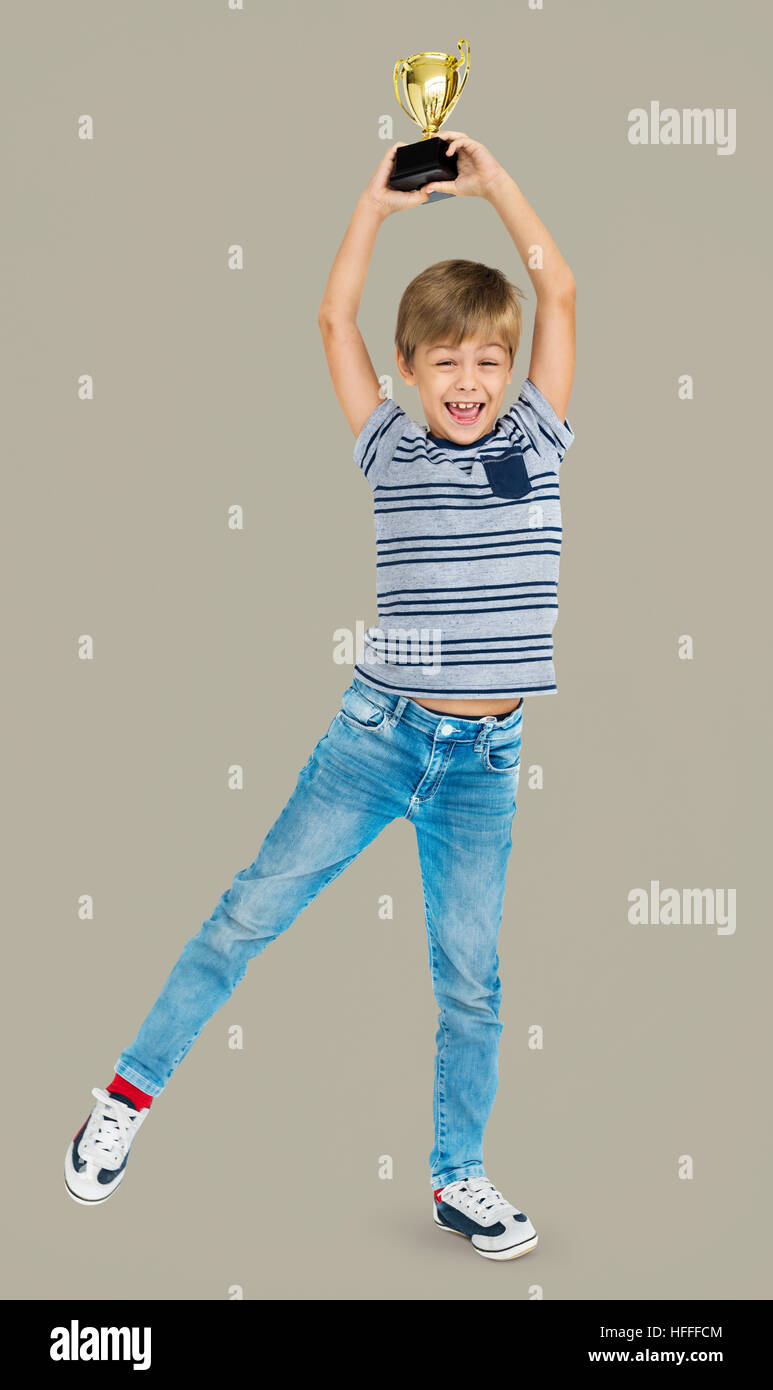Boy Won Award Reward Cup Prize Concept Stock Photo - Alamy